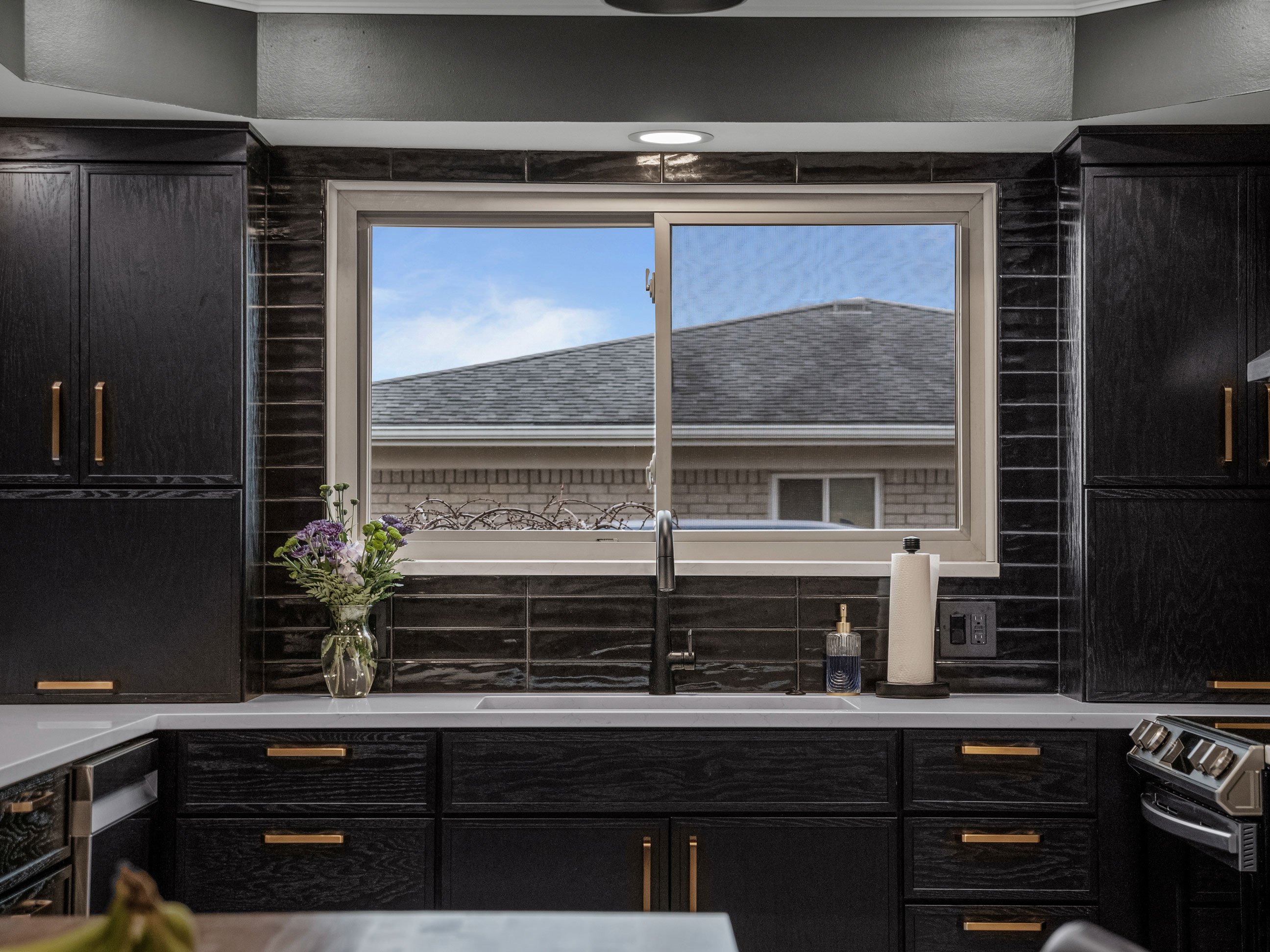 Dark & Moody Cabinets Bring Today’s Design Trends into the Kitchen