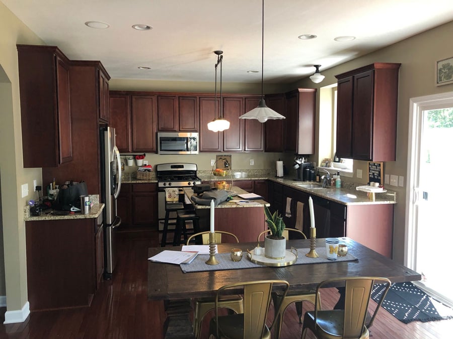 Charcoal, White, and Wood Tones Achieve Balance in a Timeless Kitchen
