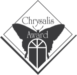 Charcoal, White, and Wood Tones Achieve Balance in a Timeless Kitchen